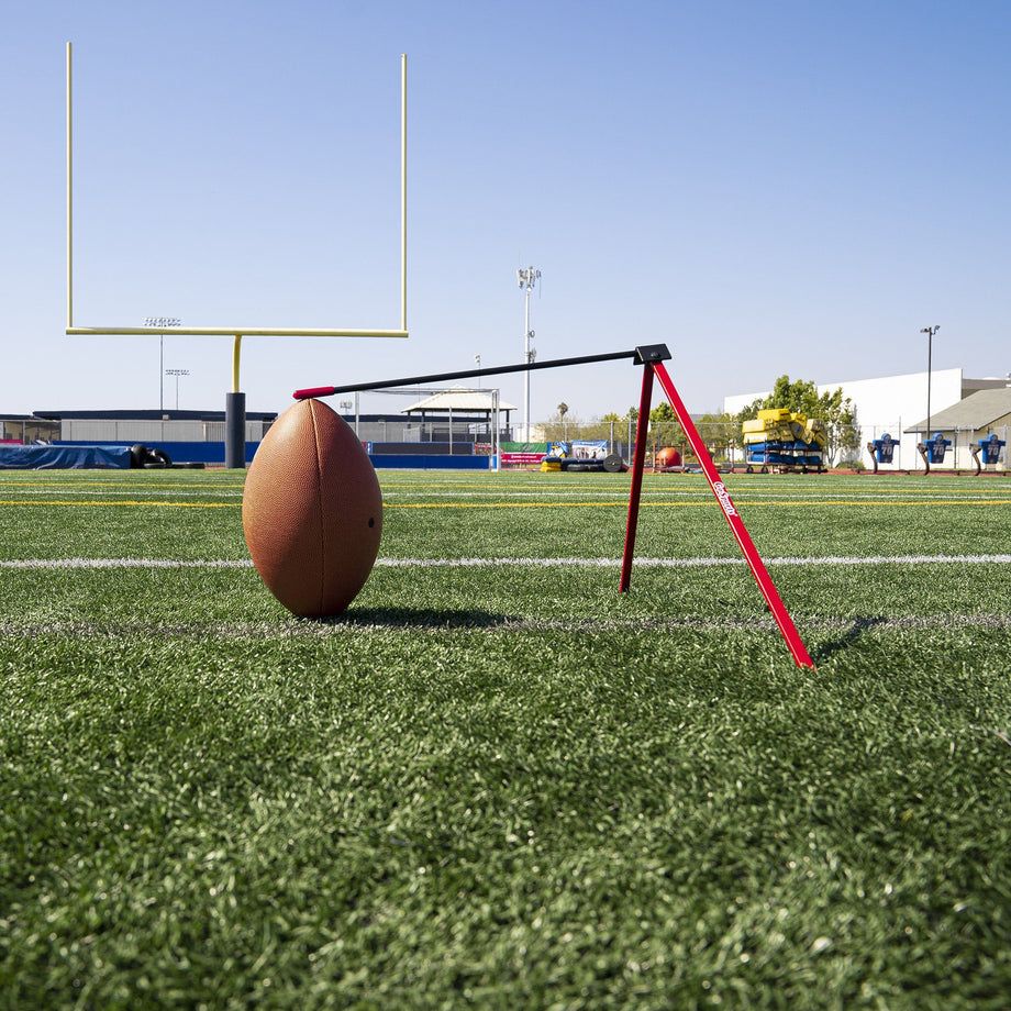 Football Field With Football On Tee